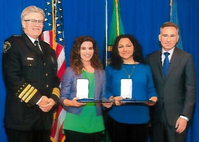 Chelsea Baylen and Nancy Garcia receiving DAJD award for their work on ...